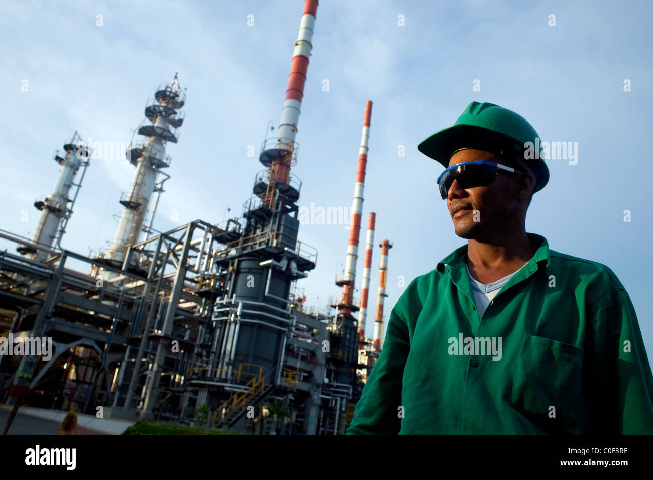 Men work at an oil refinery in Barrancabermeja, Colombia Stock Photo ...