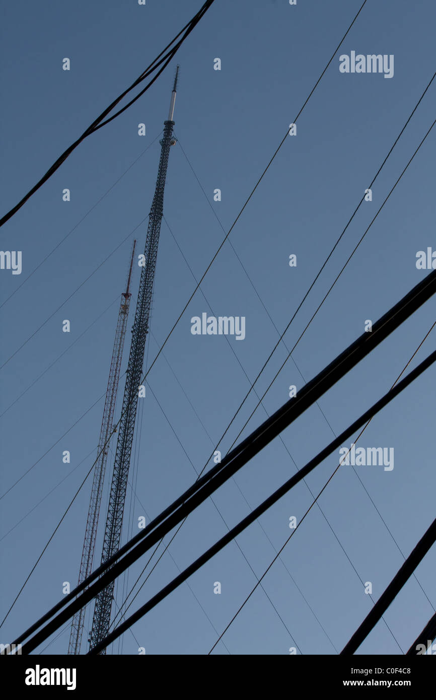 Radio antennas with power lines Stock Photo - Alamy