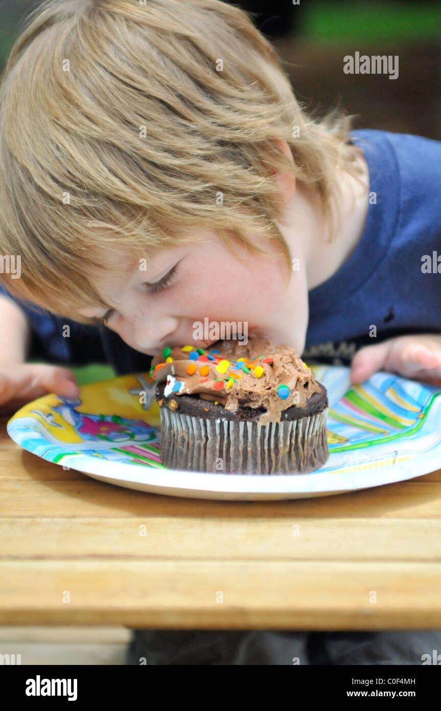 Kid Eating Cupcake