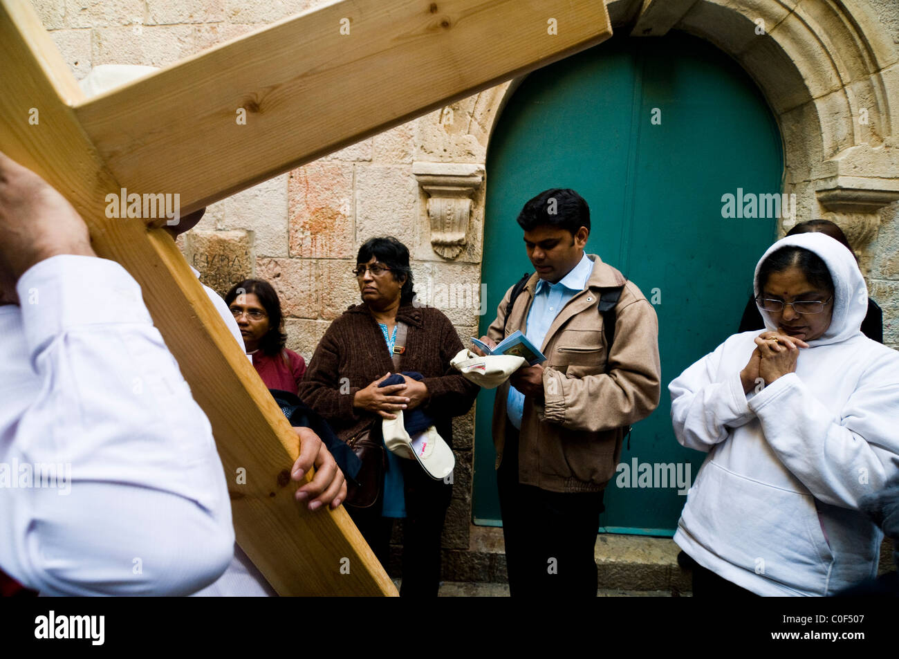 Indian Christians holding the cross on a religious pilgrimage trip ...