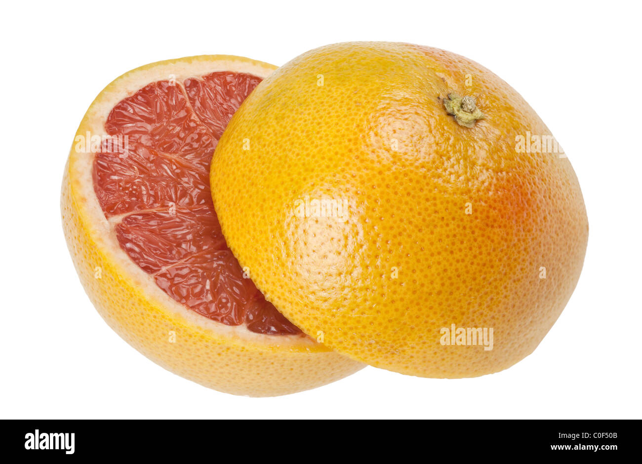 Two halves of grapefruit isolated on white background Stock Photo - Alamy