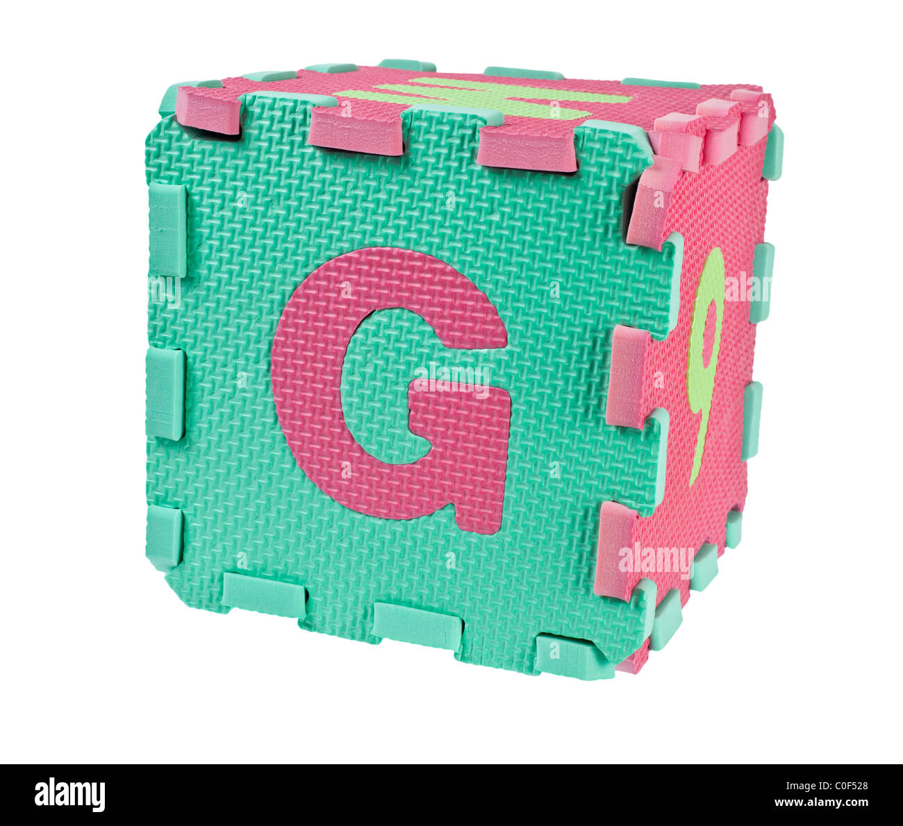 Toy blocks forming a cube with the letter G isolated on white ...