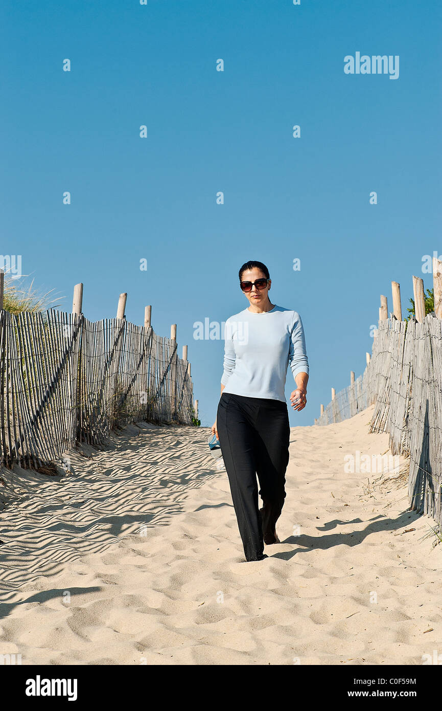 Adult adults woman women female walking hi-res stock photography and ...