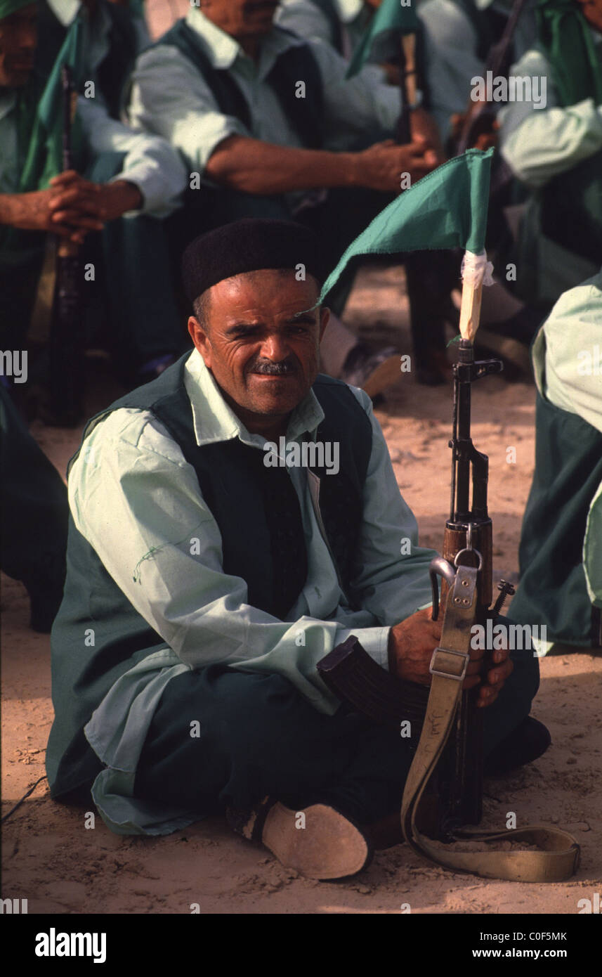 tripoli, libya -- a member of the people's revolutionary green guards ...