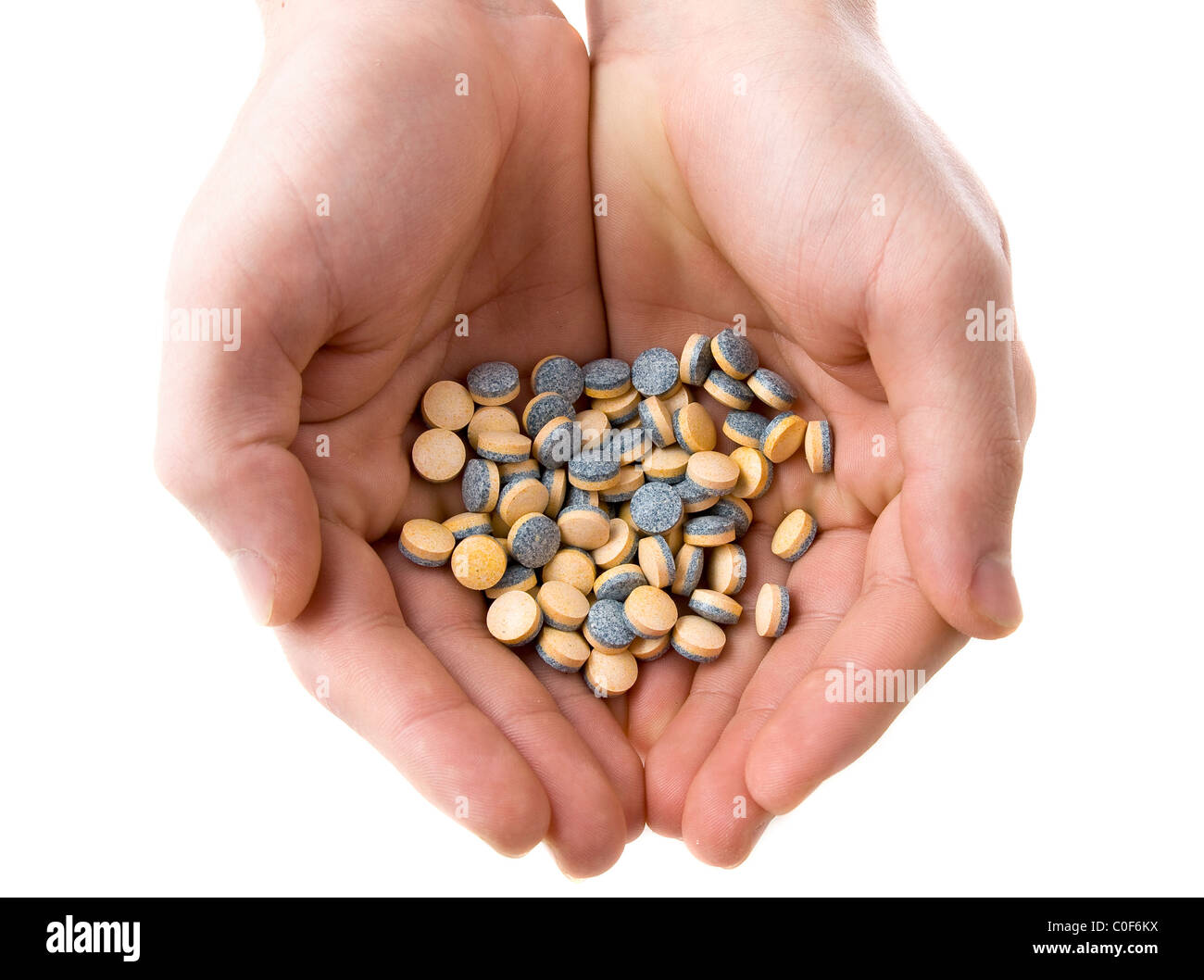 Hands offering Medicines isolated on white background Stock Photo - Alamy