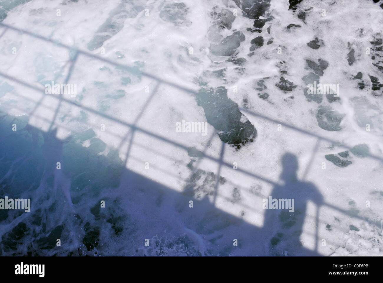 shadows on wake of ship foam Stock Photo - Alamy