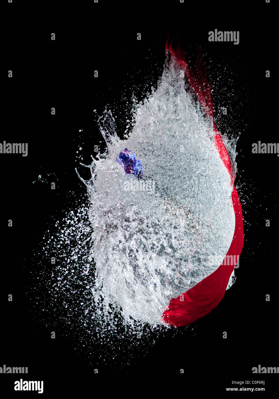 One image of a sequence showing high speed flash photography using a ...