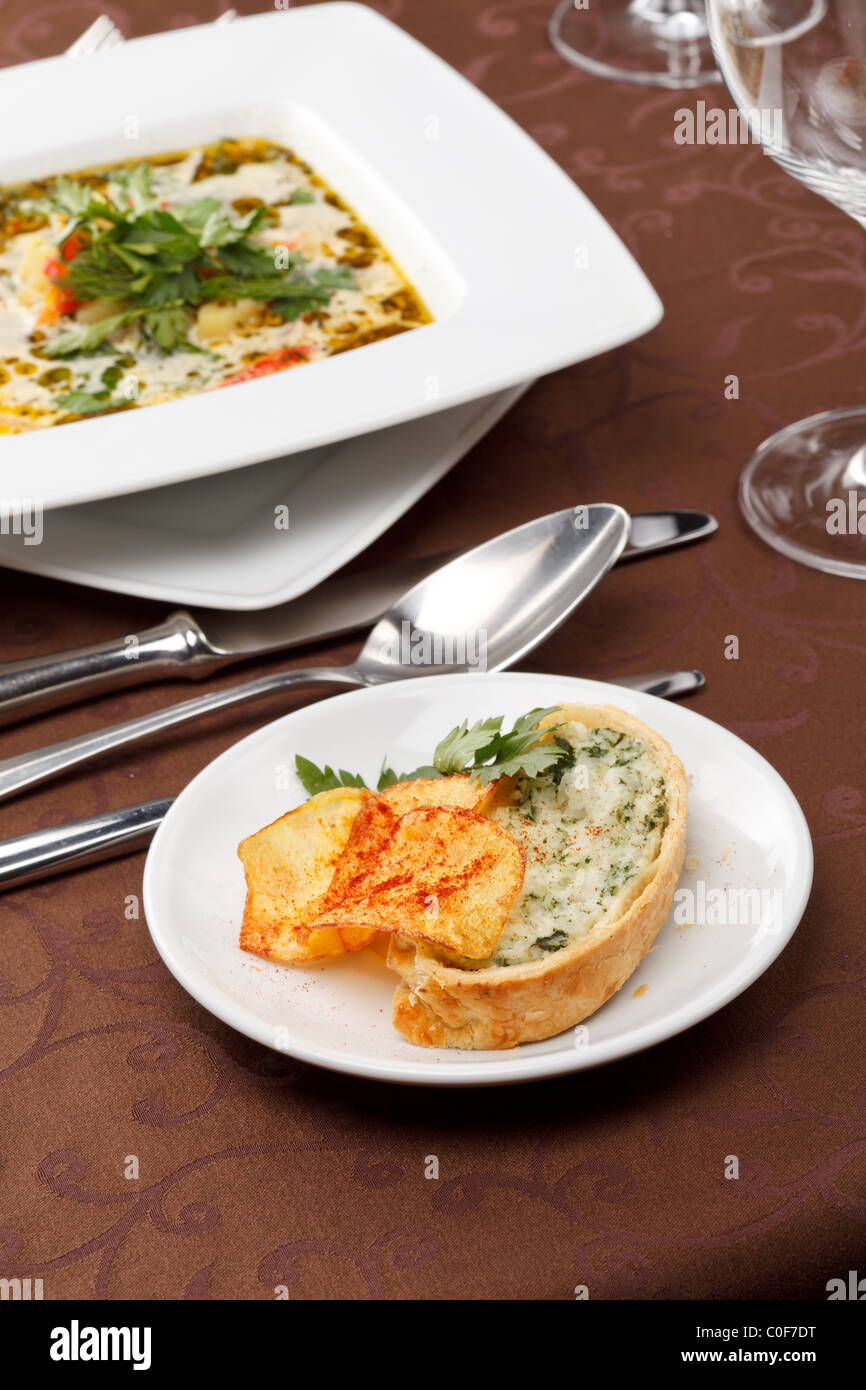 fish soup with potato chips and fish pie Stock Photo - Alamy