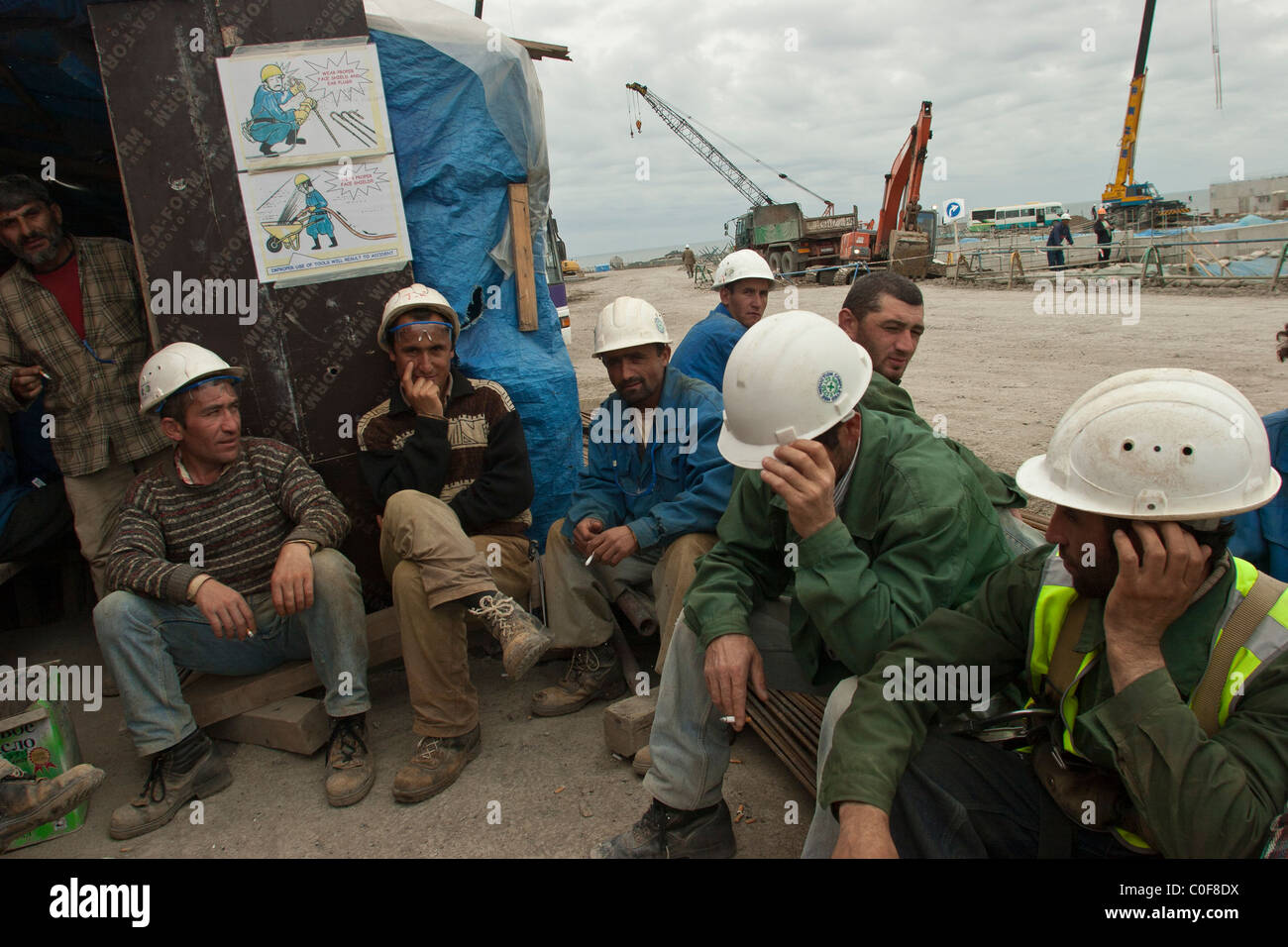 Migrant workers from Turkey during construction of the Sakenergy LNG ...