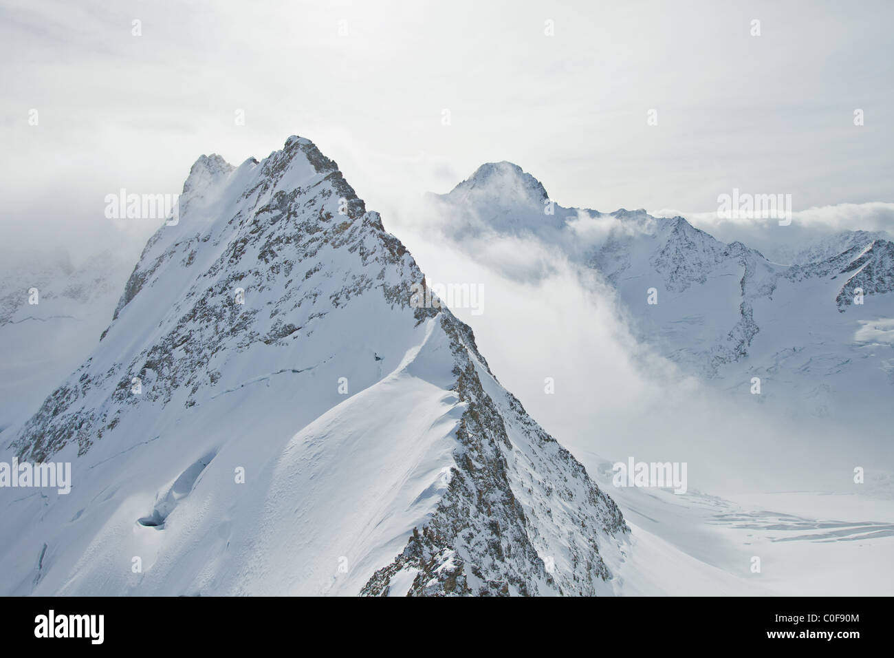 Mountain peaks surrounding the Eiger- Monch-Jungfrau seen from a ...