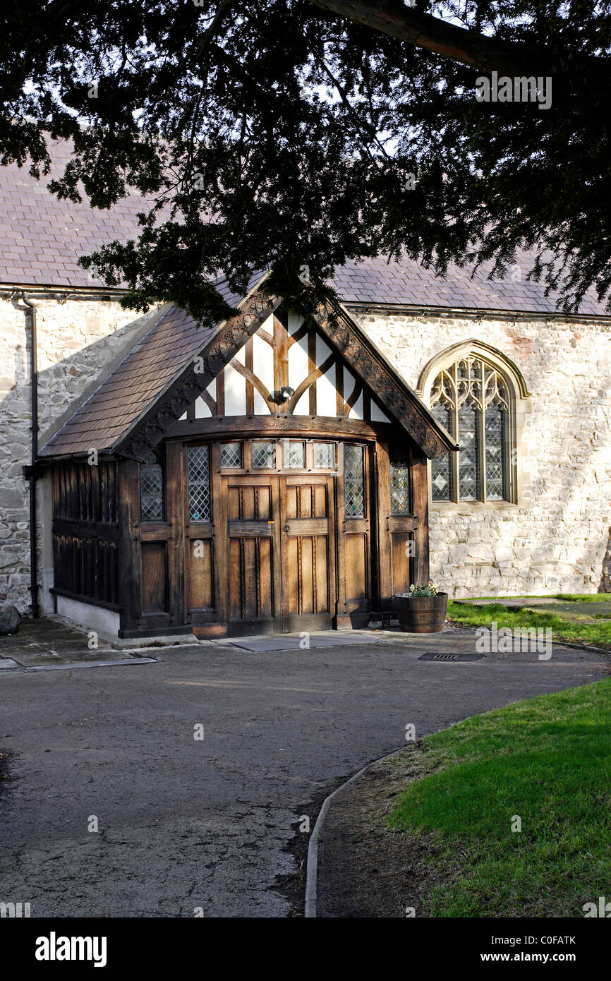 The ornate wooden entrance porch of the historic church at Abergele ...