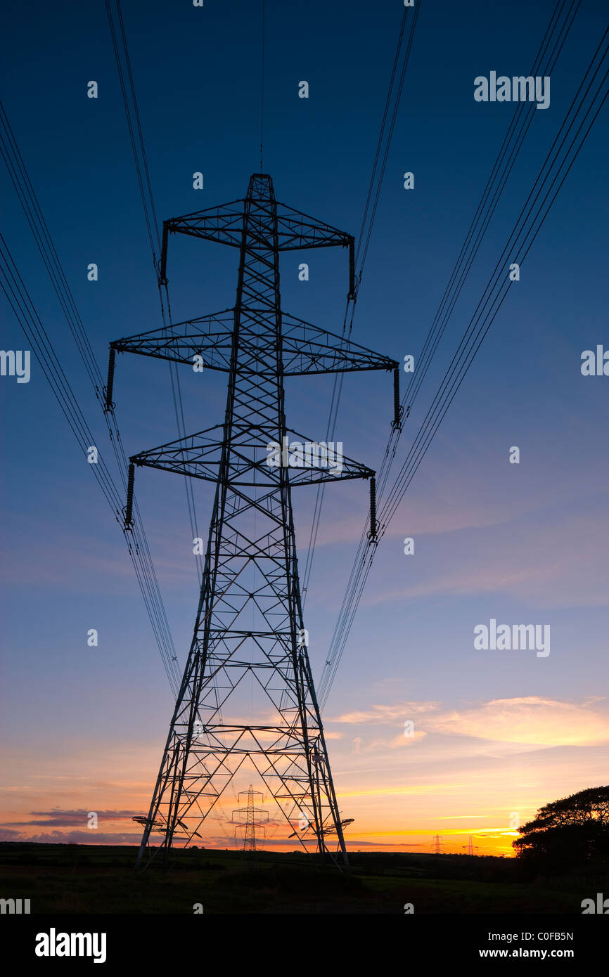 An electricity pylon of the National Grid in Wales at sunset Stock ...
