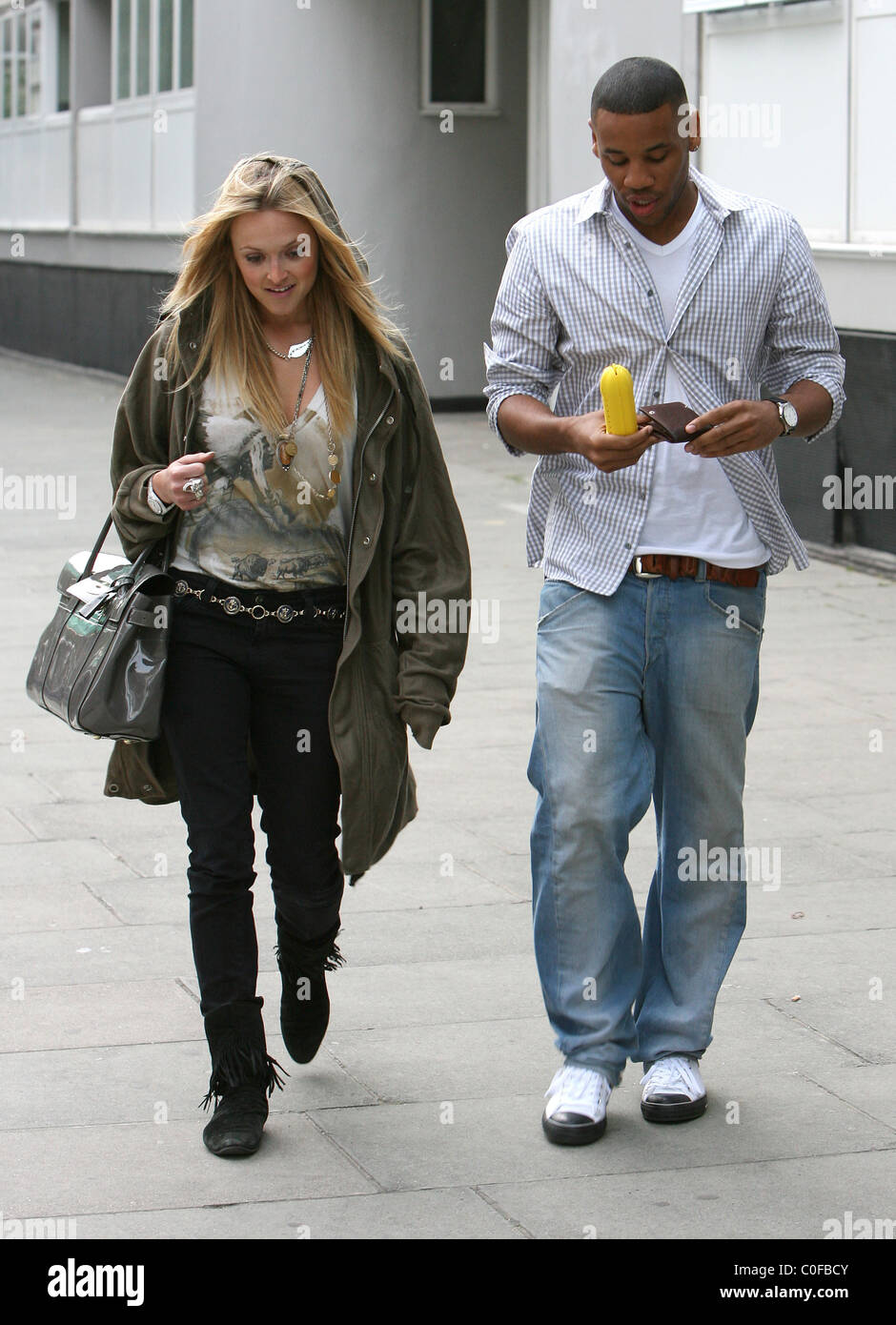 Fearne Cotton and Reggie Yates leaving the Radio 1 studios having ...