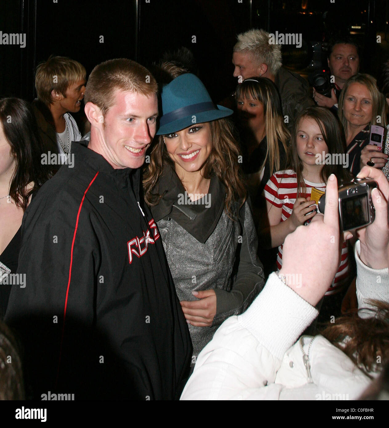 Cheryl Cole Girls Aloud greet fans and sign autographs as they return ...