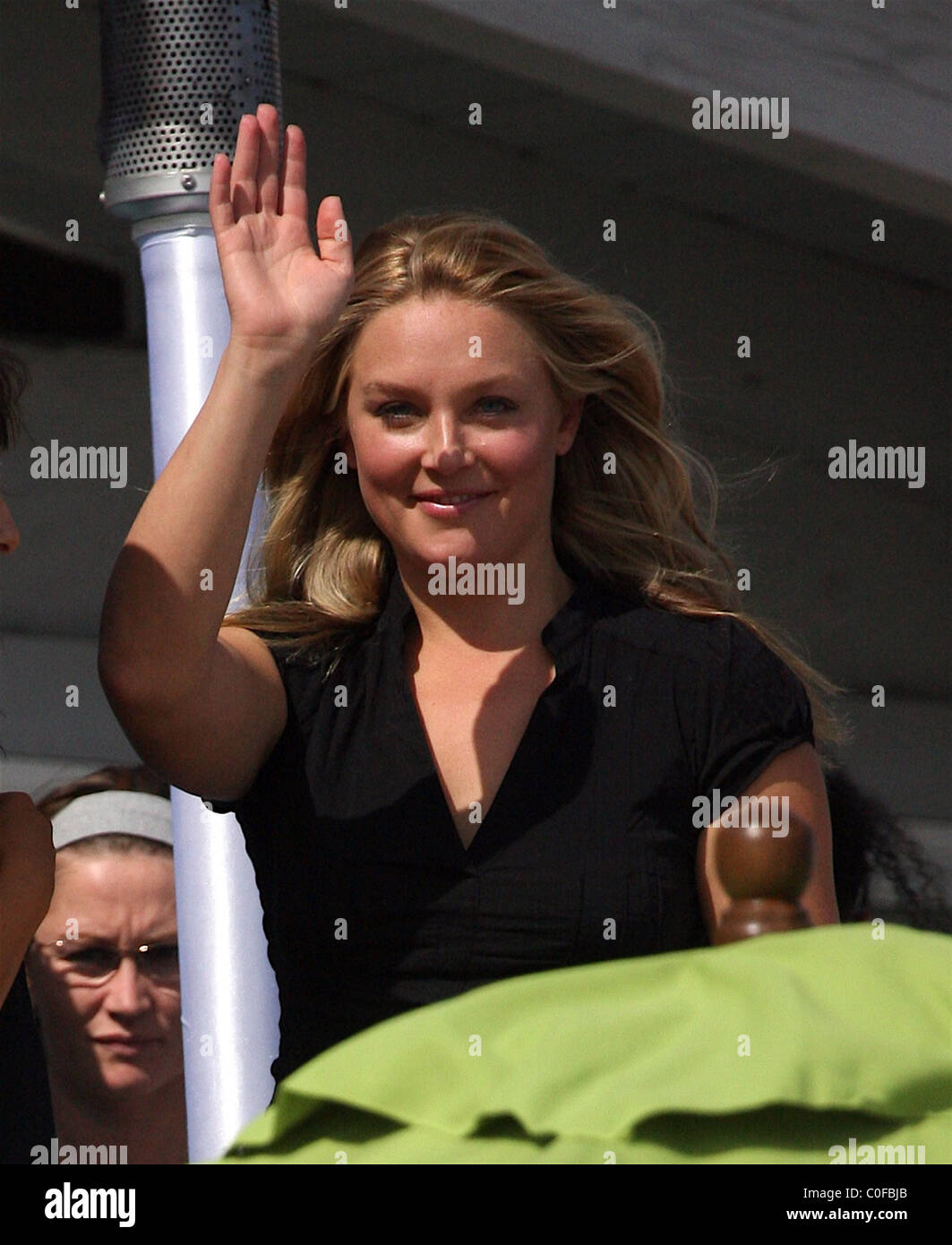 Elizabeth Rome having fun at a beach party in Malibu Malibu, California ...