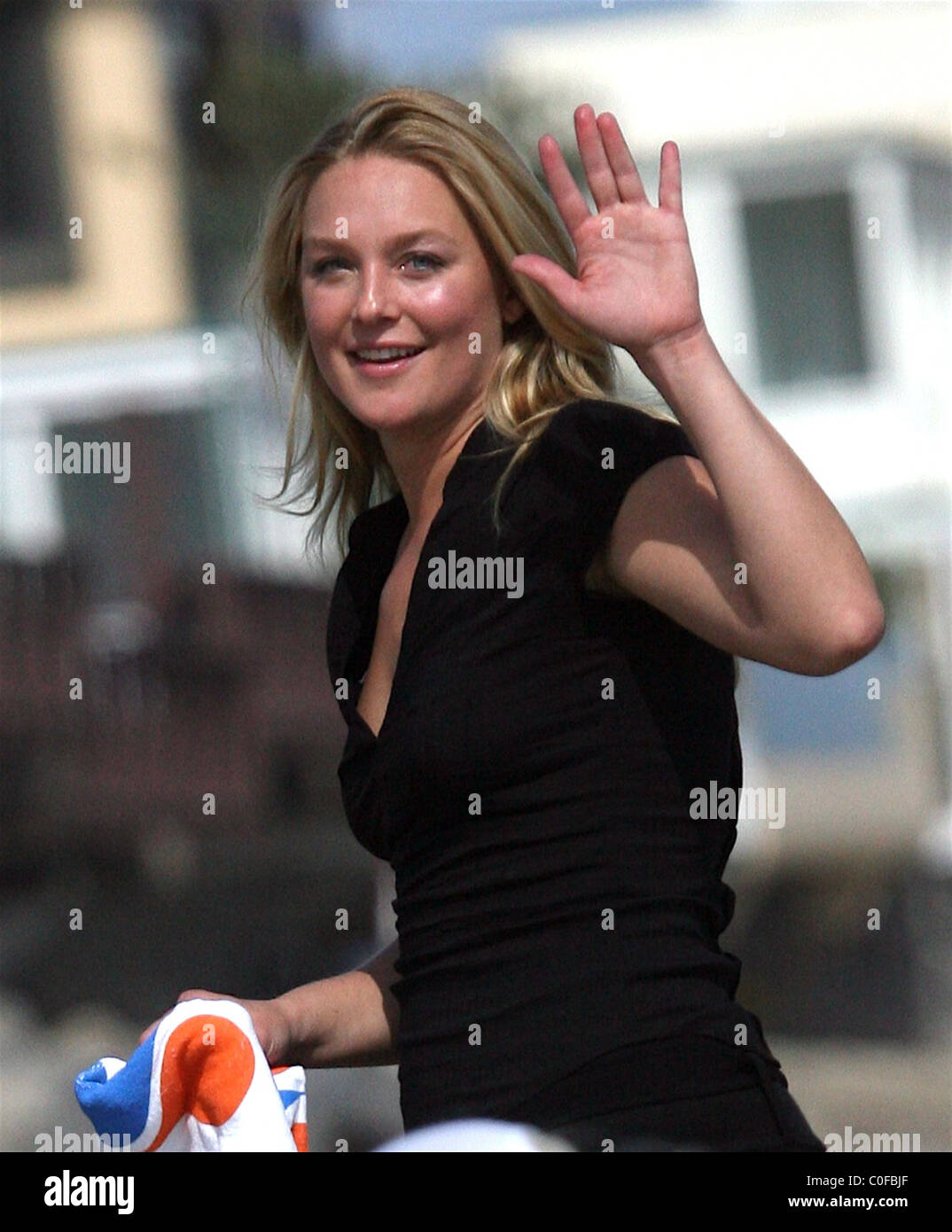 Elizabeth Rome having fun at a beach party in Malibu Malibu, California ...