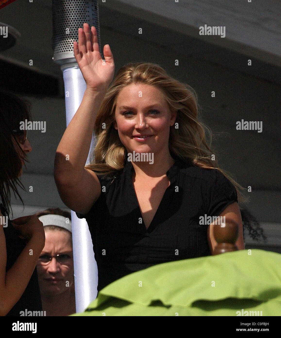 Elizabeth Rome having fun at a beach party in Malibu Malibu, California ...