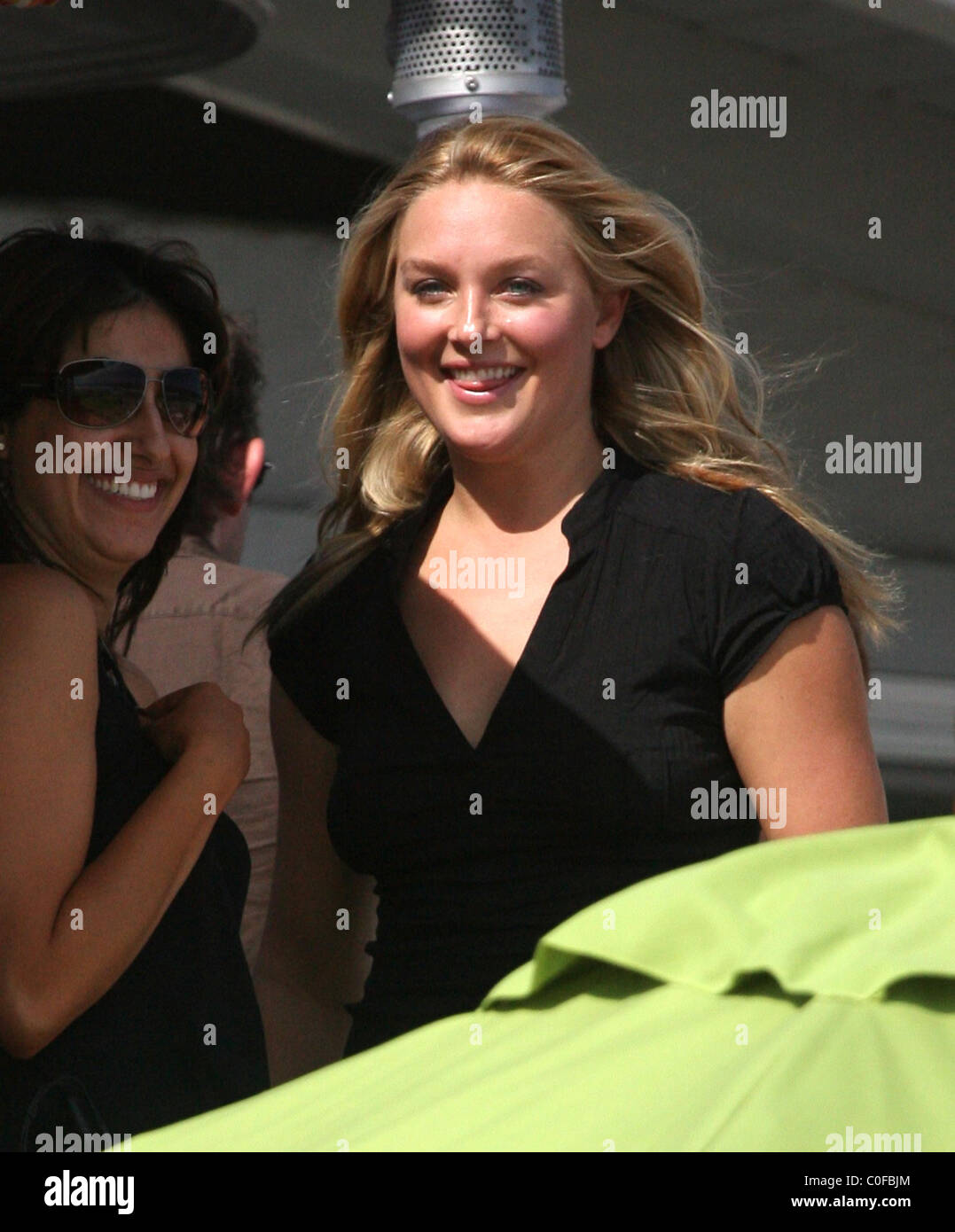 Elizabeth Rome having fun at a beach party in Malibu Malibu, California ...