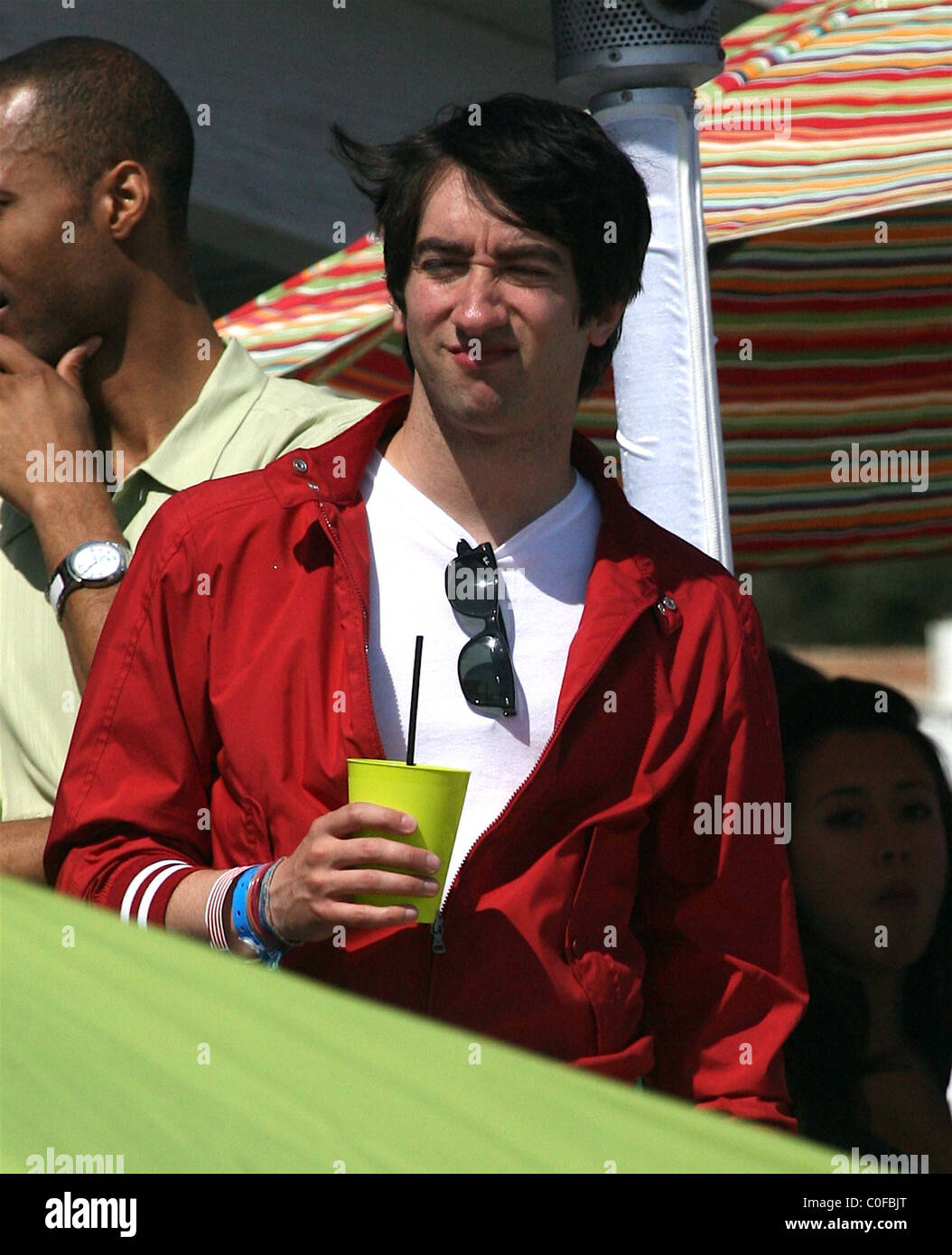 Tom Higgenson from the band Plain white T's having fun at a beach party ...