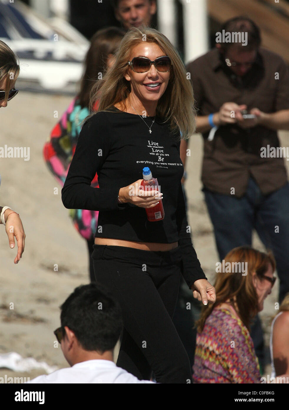 Linda Thompson having fun at a beach party in Malibu Malibu, California ...