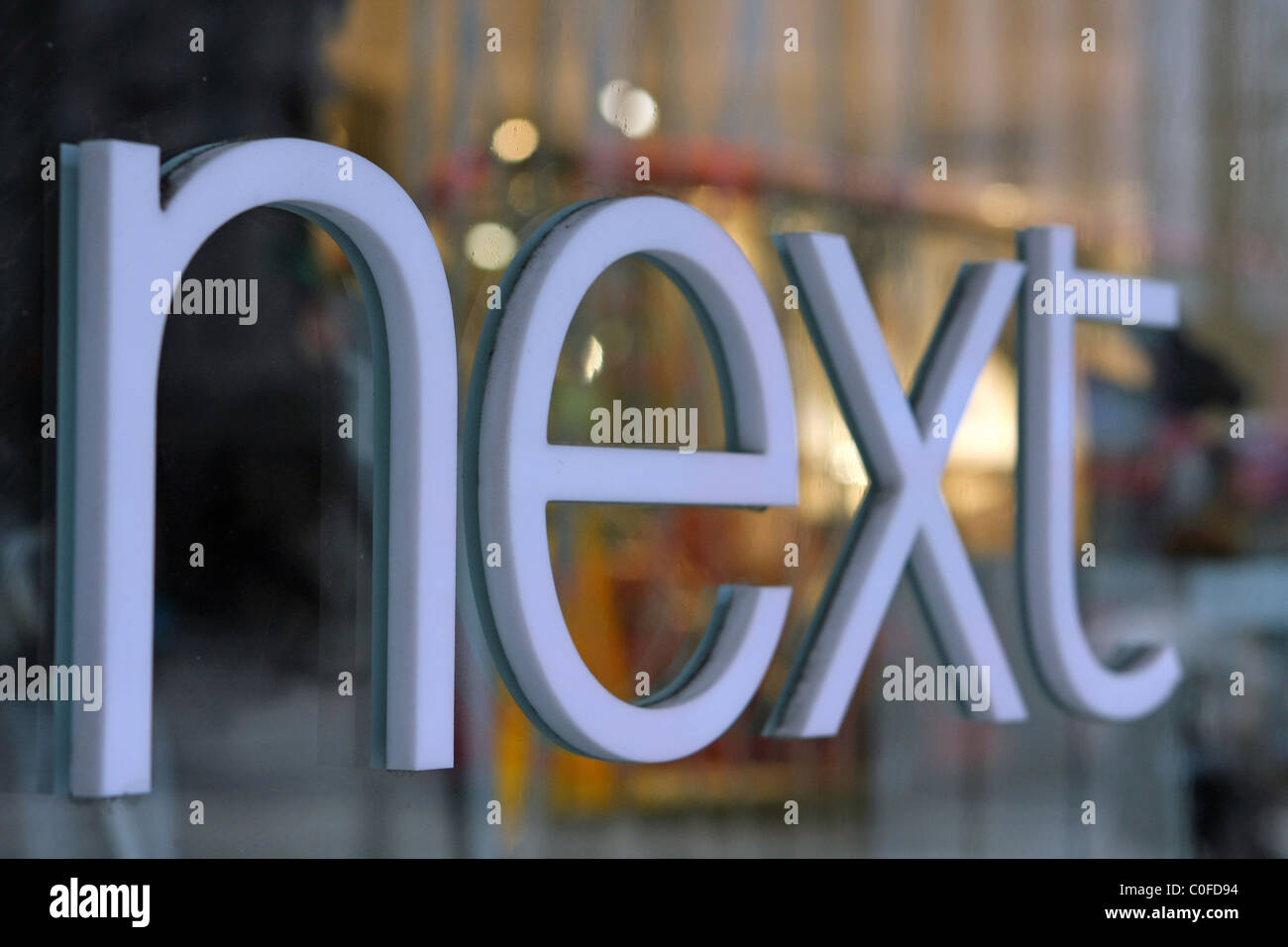 The 'Next' sign on one of their Oxford Street store windows Stock Photo ...