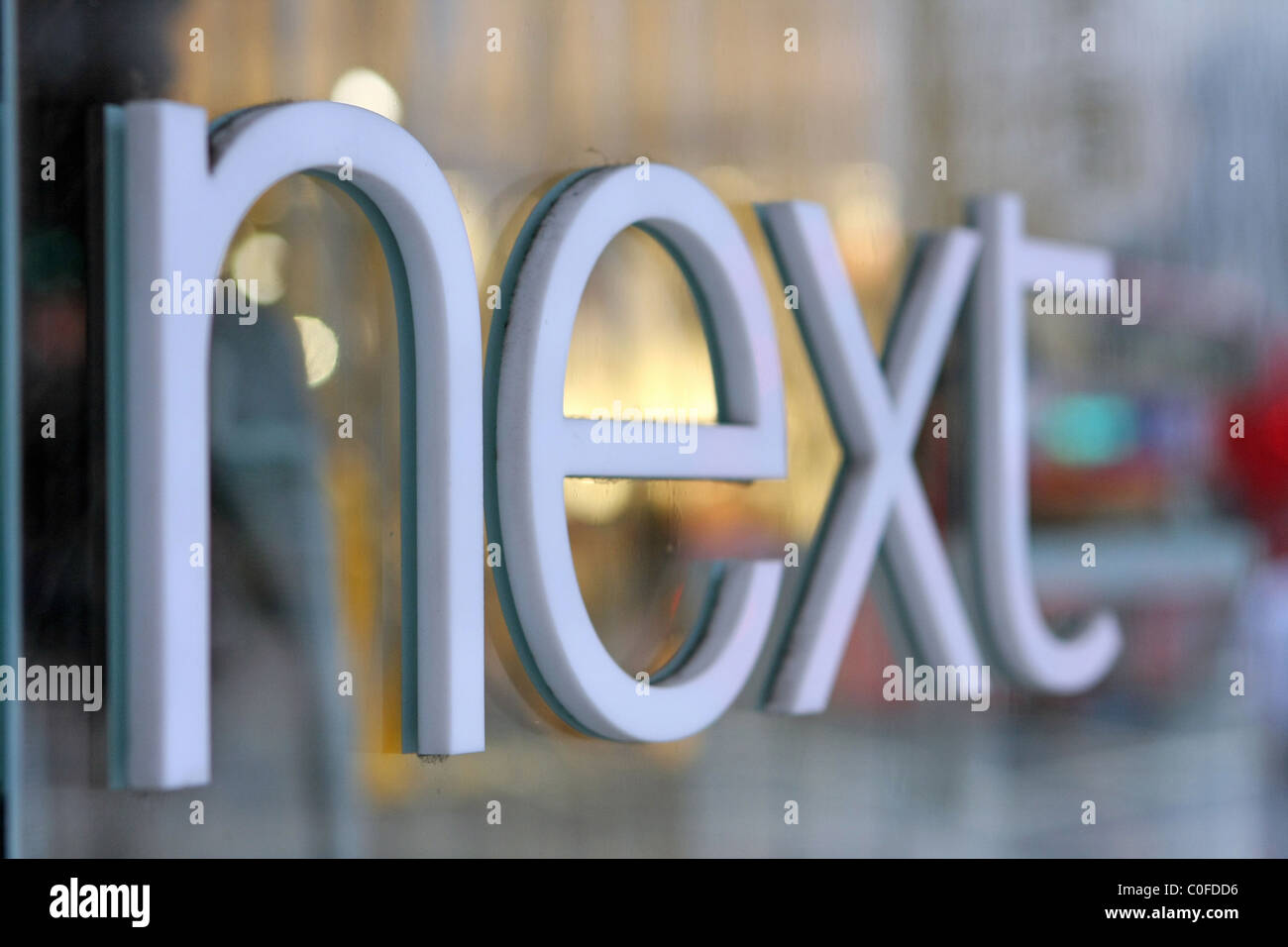 The 'Next' sign on one of their Oxford Street store windows Stock Photo ...