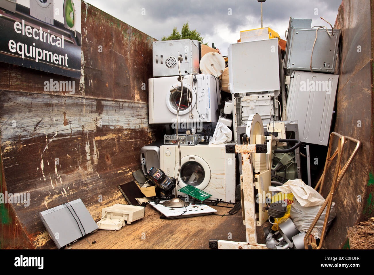 Recycling electrical equipment including washing machines Stock Photo ...