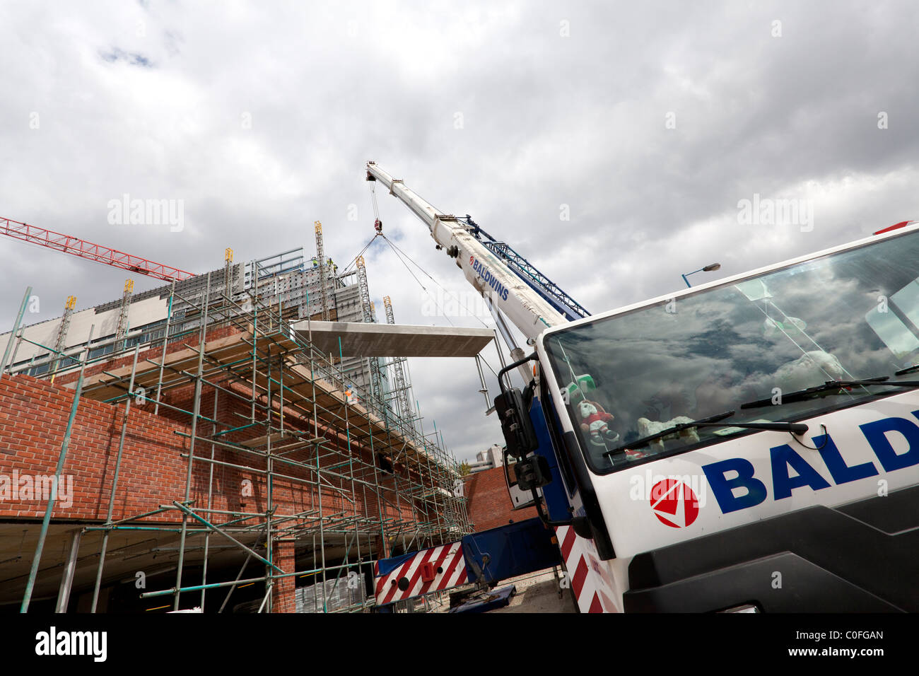 Crane at the construction hi-res stock photography and images - Alamy