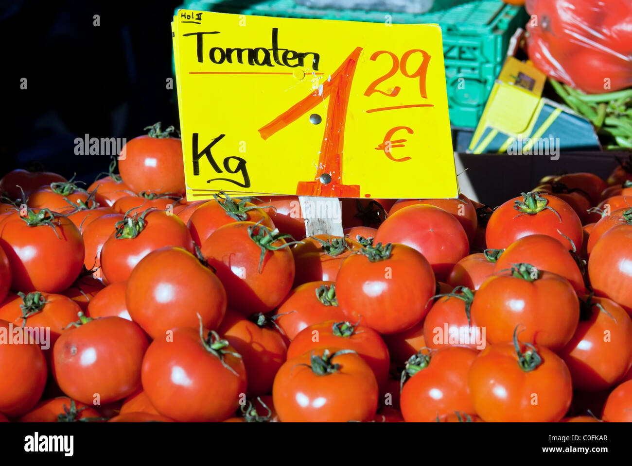 many red tomatoes at the vegetable market to buy Stock Photo - Alamy