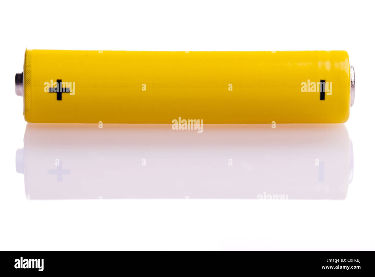 a yellow battery transverse with mirroring Stock Photo - Alamy