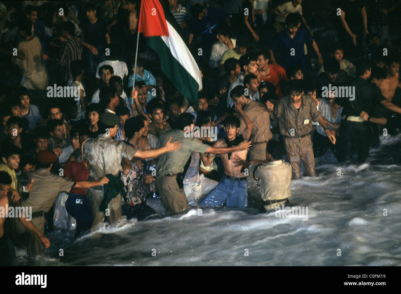 Libyans celebrate as fresh water flows into the Ajdabiya reservoir near ...