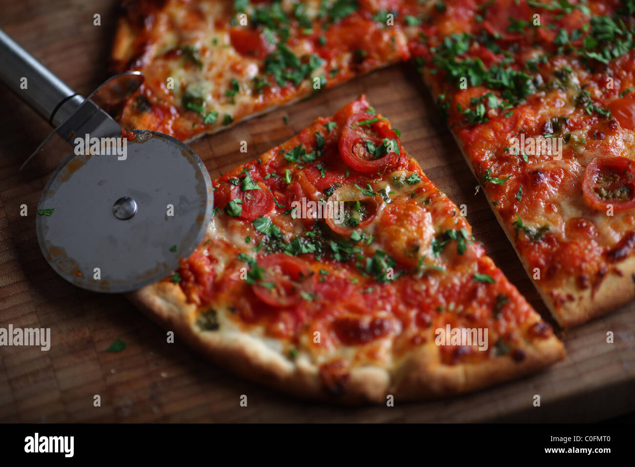 Cooked slice of homemade Pizza Stock Photo - Alamy