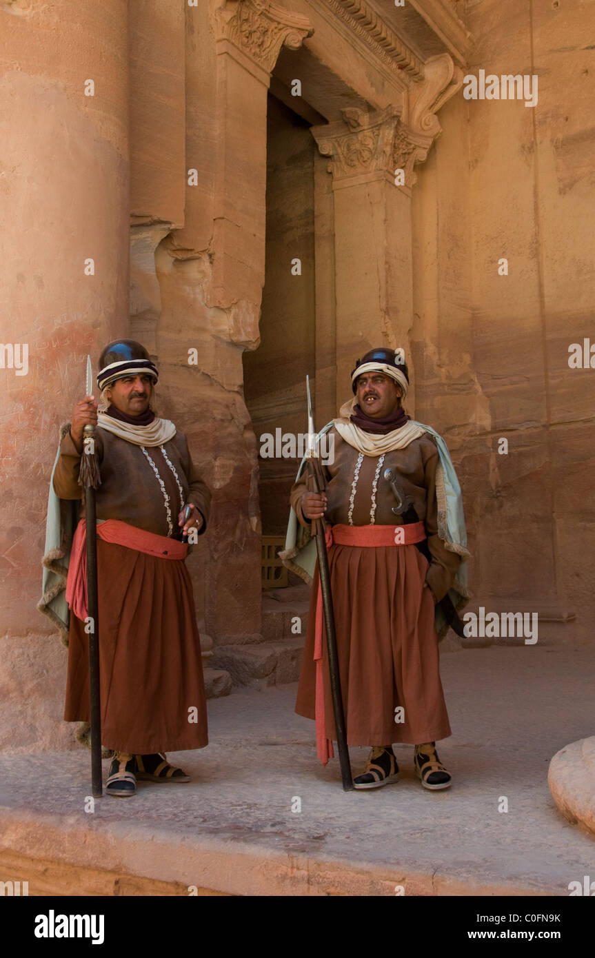 Jordanian men dressed as Nabatean warriors at the entrance to the rock ...