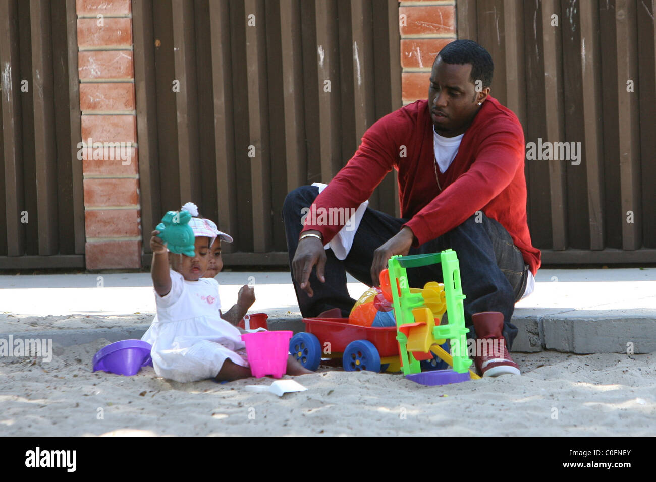 Sean 'P. Diddy' Combs plays with his twin daughters D'Lila Star Combs ...
