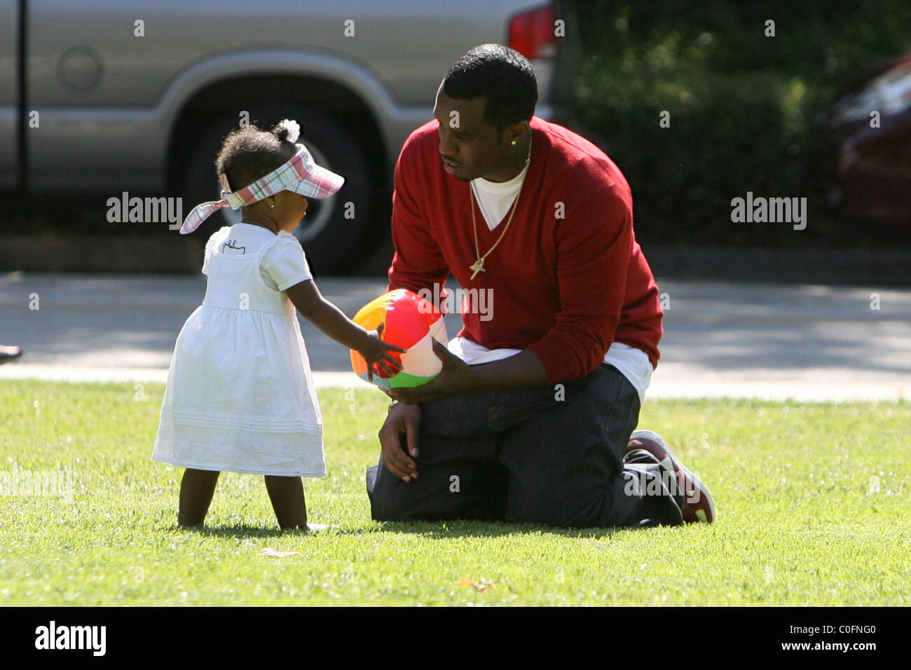 Sean 'P. Diddy' Combs plays with his twin daughters D'Lila Star Combs ...