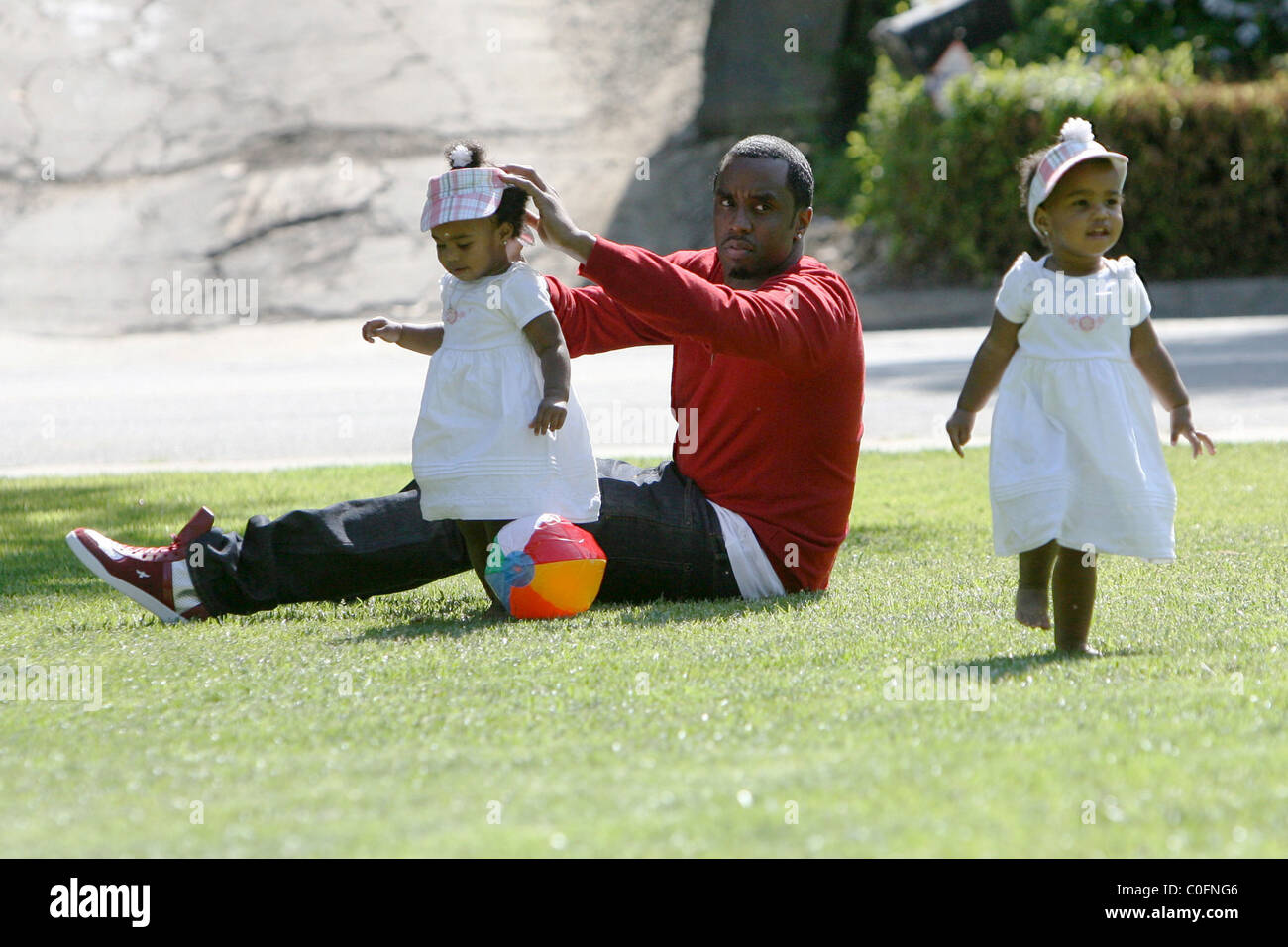 Sean 'P. Diddy' Combs plays with his twin daughters D'Lila Star Combs ...