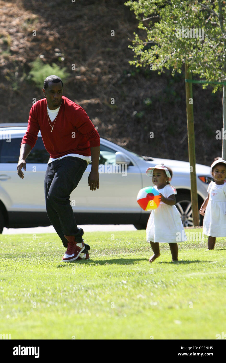 Sean 'P. Diddy' Combs plays with his twin daughters D'Lila Star Combs ...