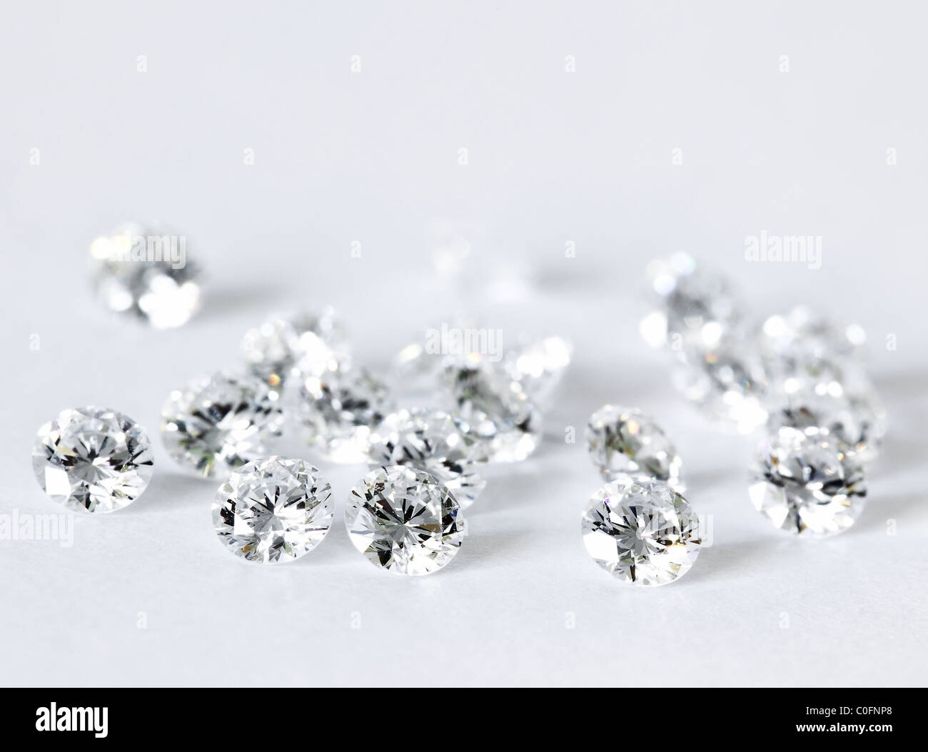 Loose diamonds, round brilliant cut.on white background Stock Photo - Alamy