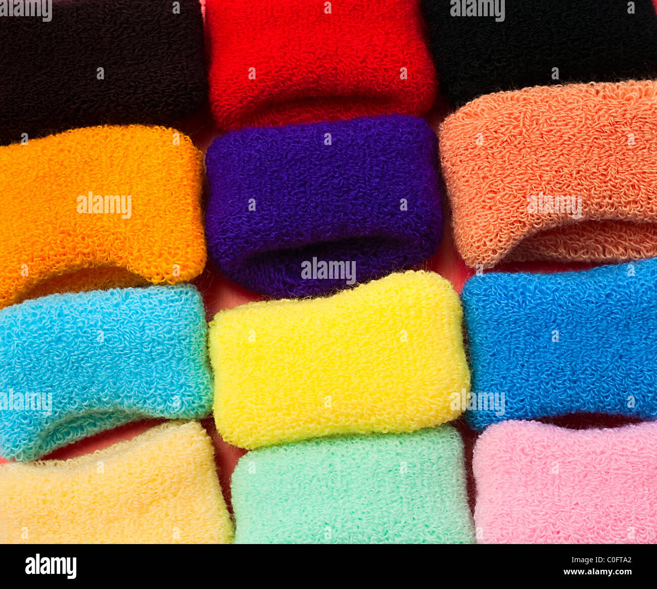 Background from colored hair binders. Close up Stock Photo - Alamy