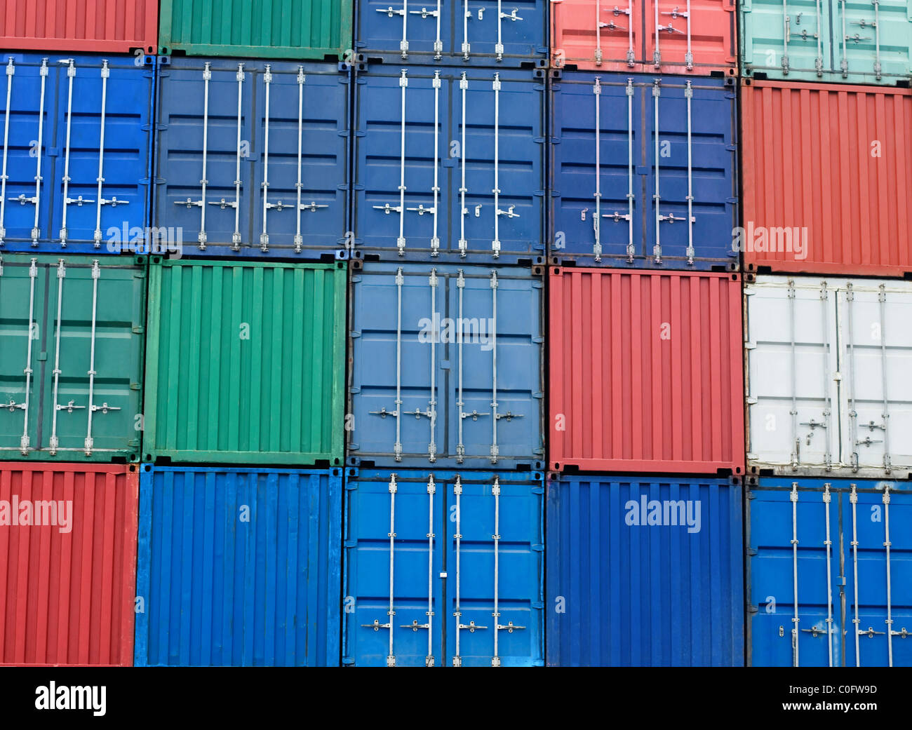 background of multi-colored freight shipping containers at the docks ...