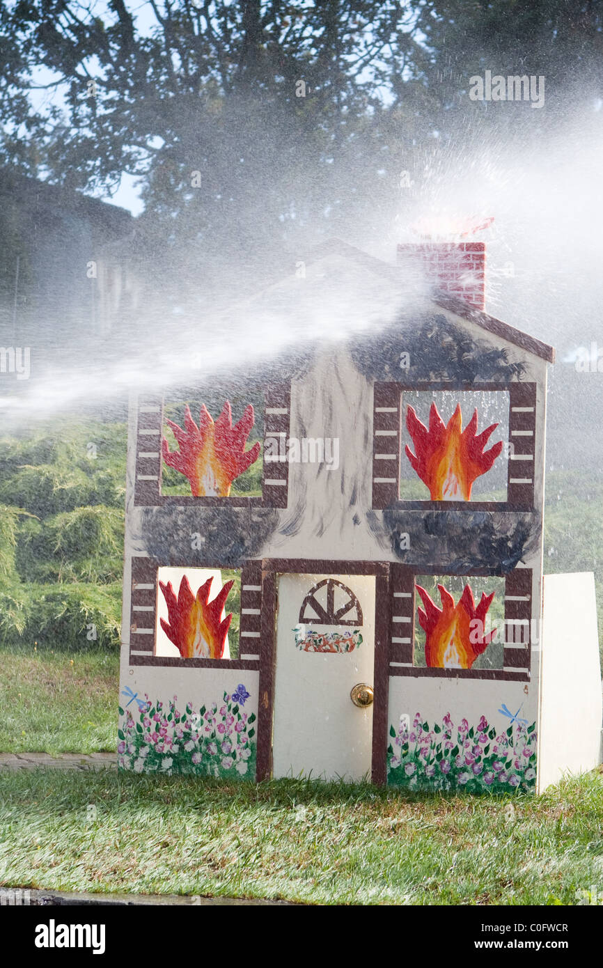 Fake fire being extinguished at an open house with the View Royal Fire ...