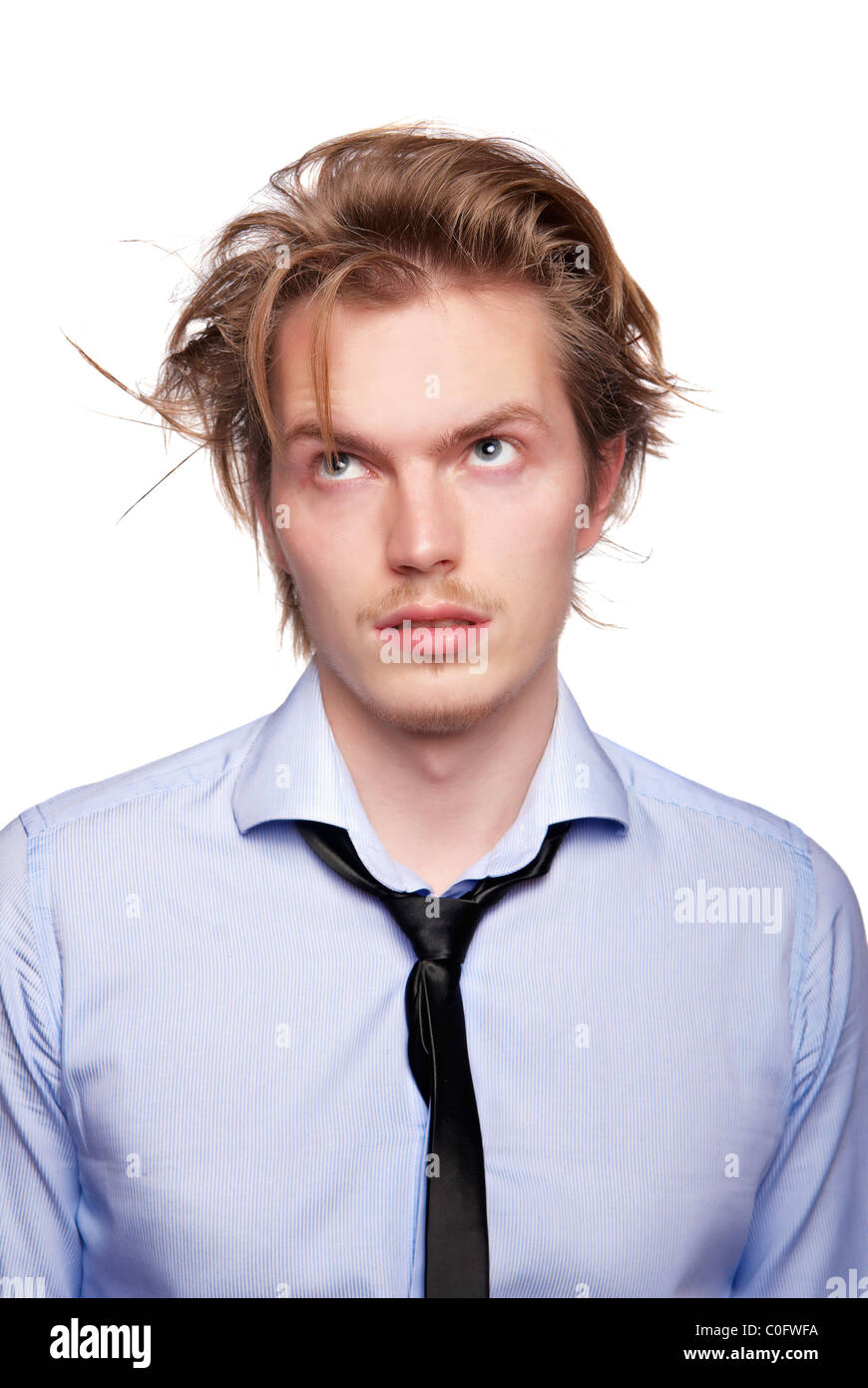 Young man expression portrait. Studio photo of young man with funny ...