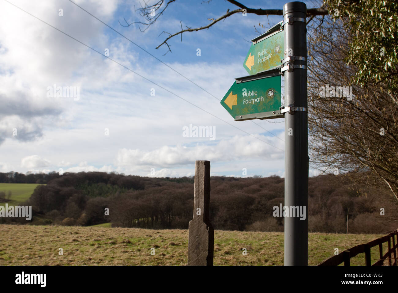 Public footpaths sign pointing out over fields near Wendover ...