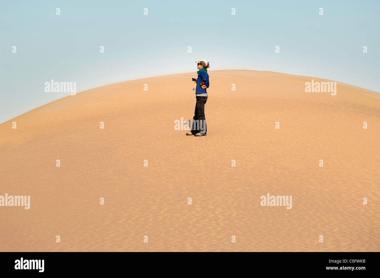 Lone figure standing hi-res stock photography and images - Alamy