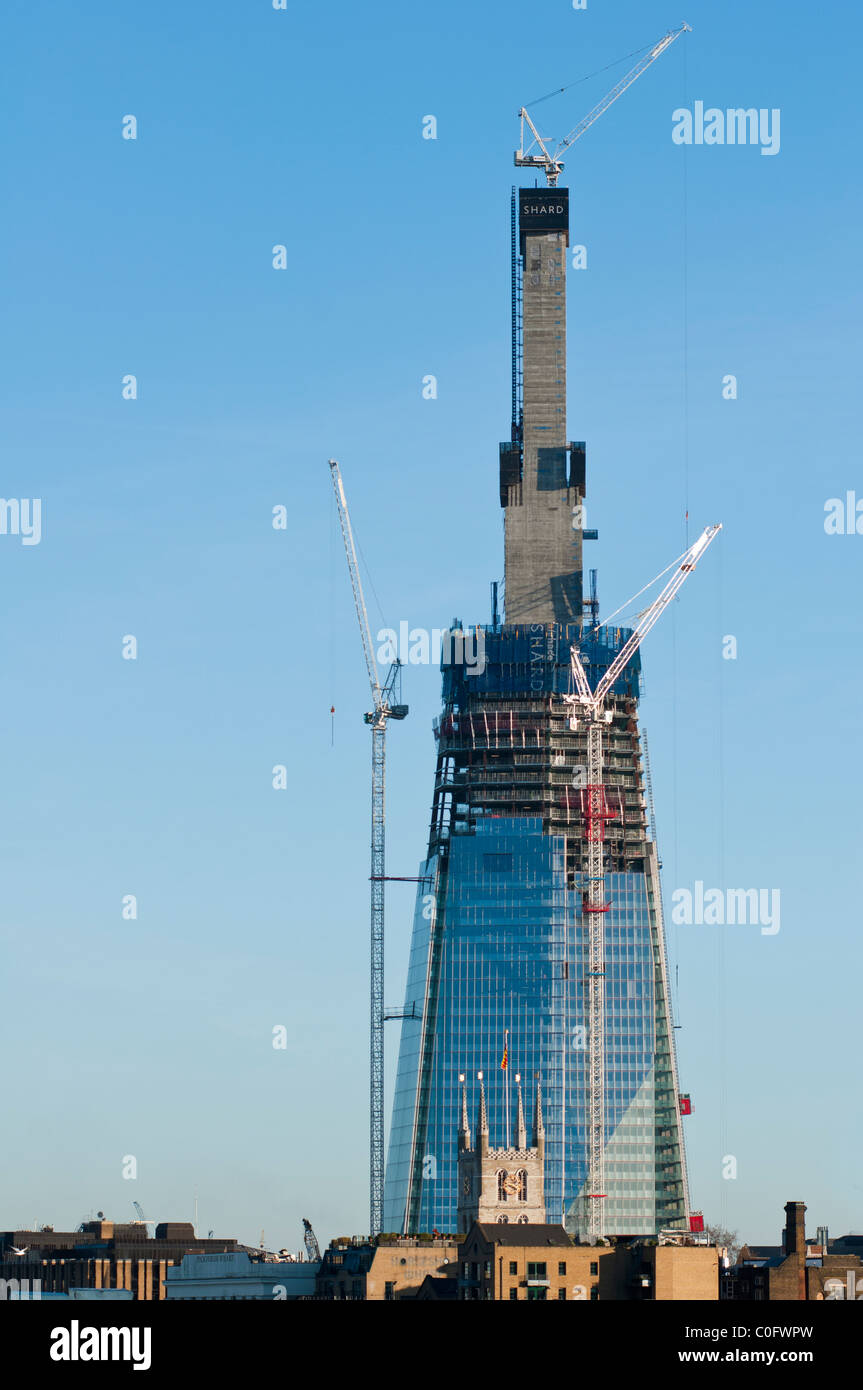 The Shard under construction contrasting with Southwark Cathedral at it ...