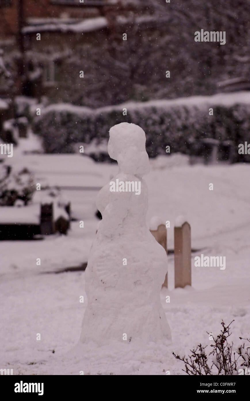 Snowman in a Cemetery Stock Photo - Alamy