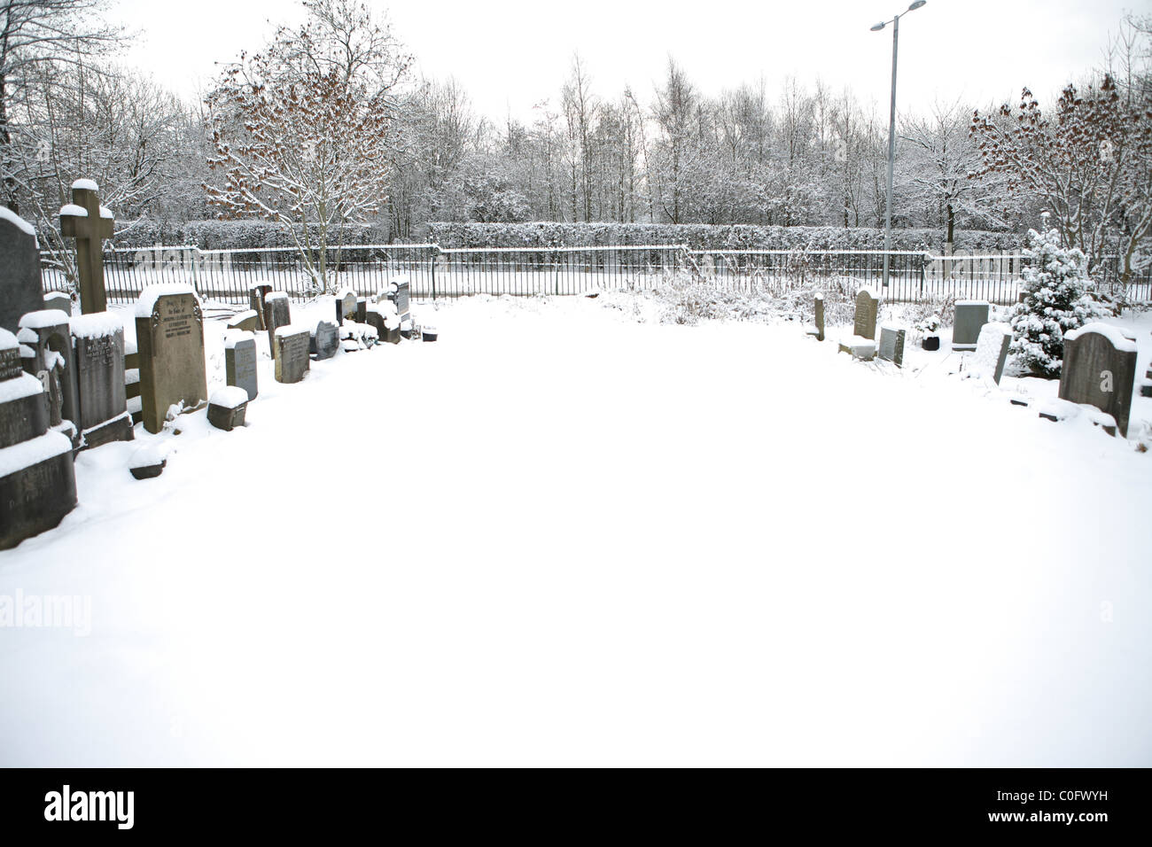 Snow fall on grave yard in England Stock Photo - Alamy