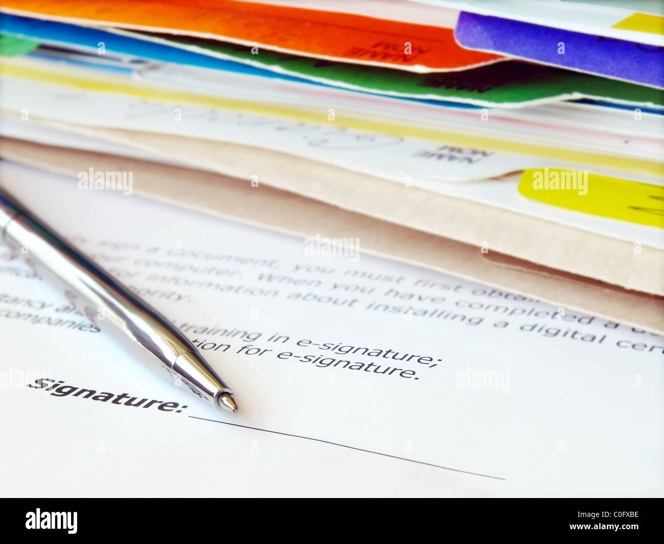 Signing a contract. Focus is on the signature and pen Stock Photo - Alamy