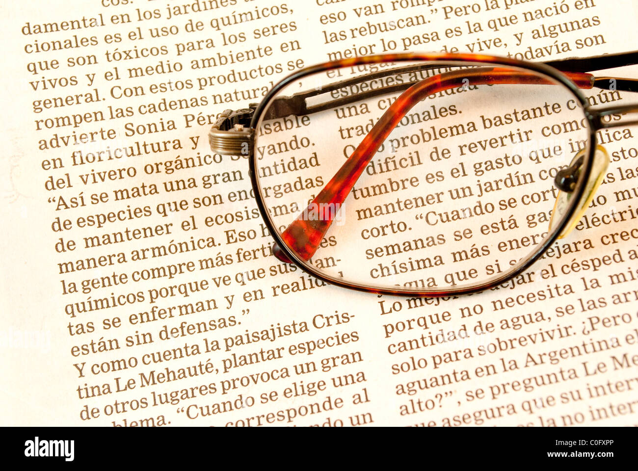 lenses and newspaper Stock Photo - Alamy