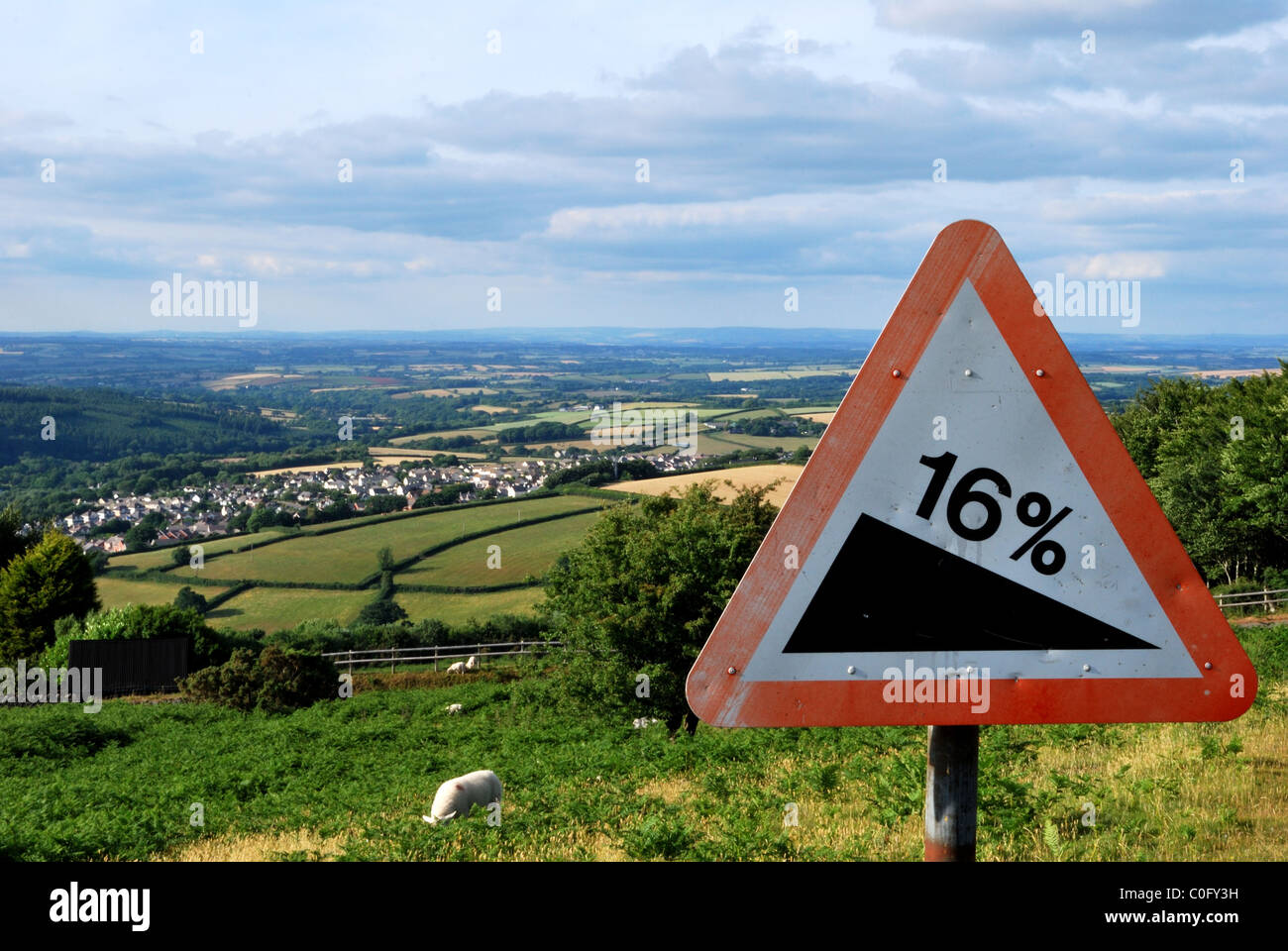 View across Devon from Dartmoor including 16% road sign in foreground ...